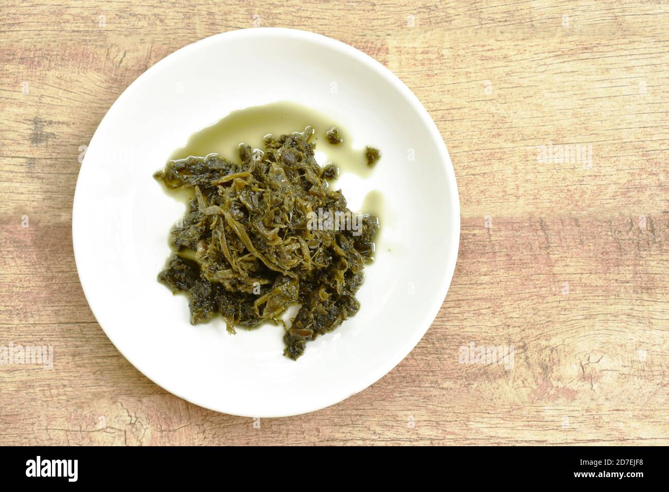 stir fried pickled mustard or Gan Lan Cai close up of Chinese food made ...