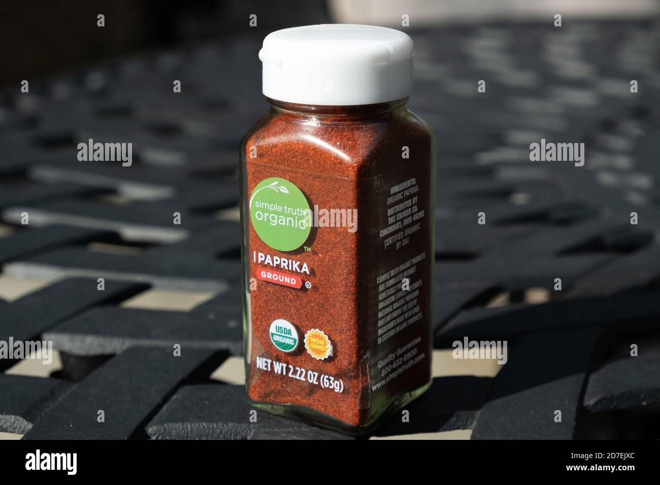 Glass Bottle of Simple Truth Organic Paprika on Outdoor Table Stock ...