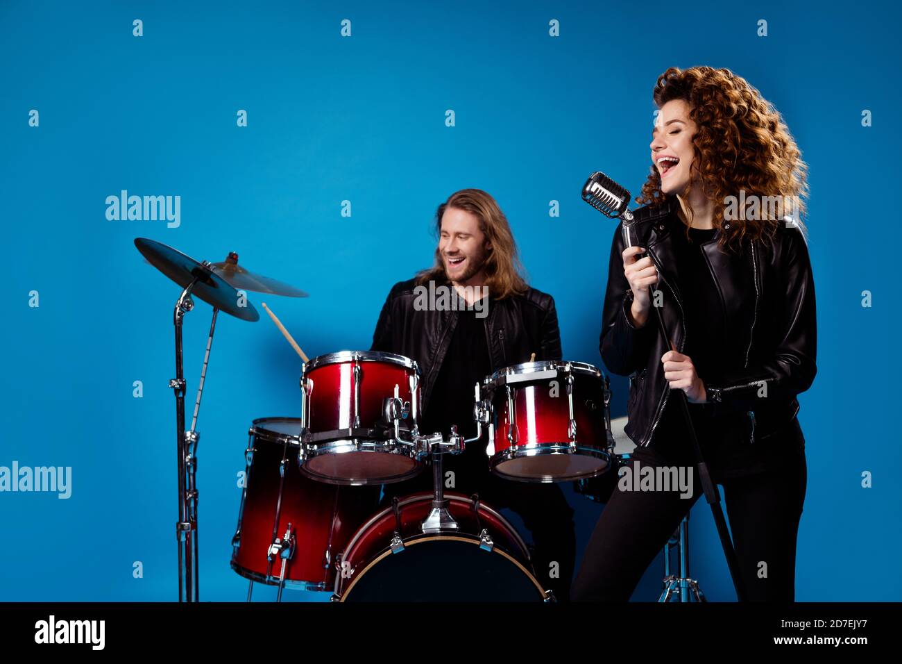 Positive cheerful punk two people girl sing song guy play drum ...