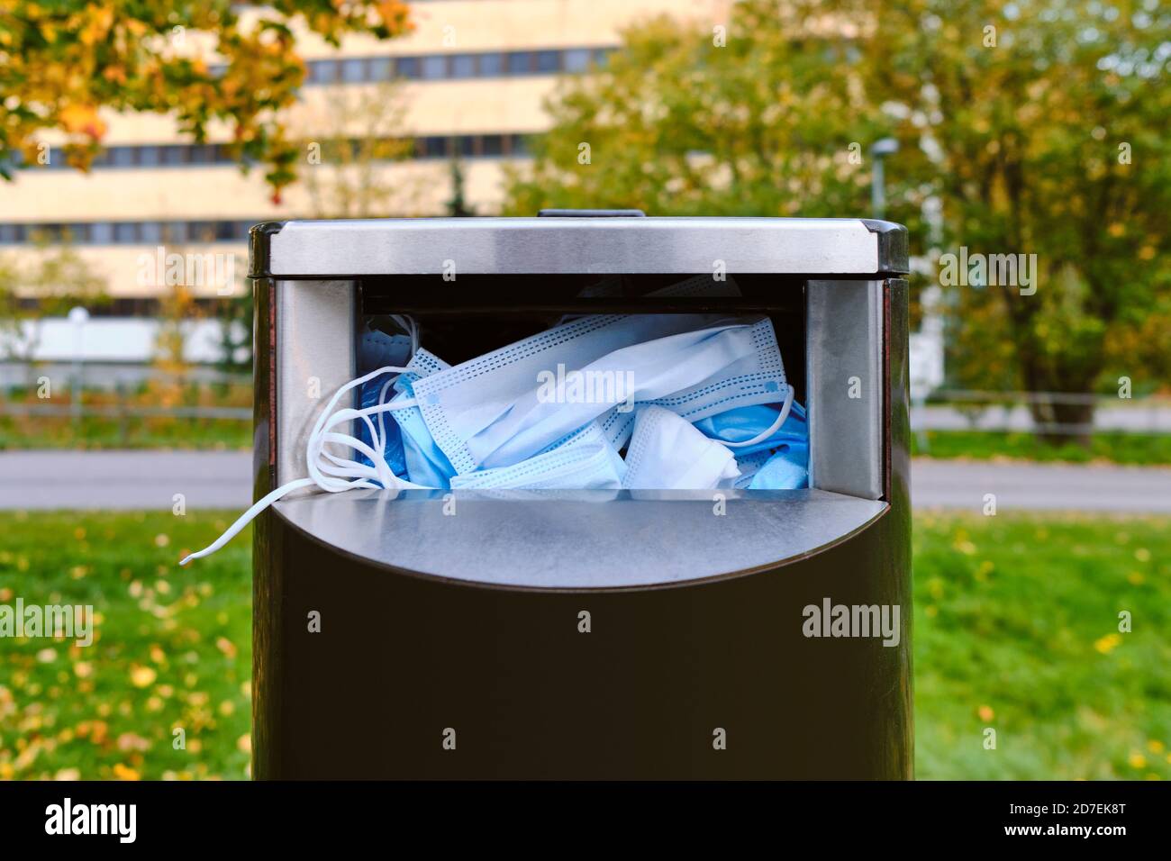 The used face masks in the street garbage bin during the COVID-19 ...