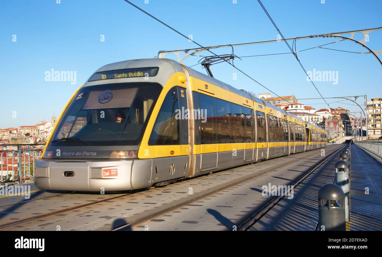 Modern cable car in Porto. A modern cable car in motion on the main ...
