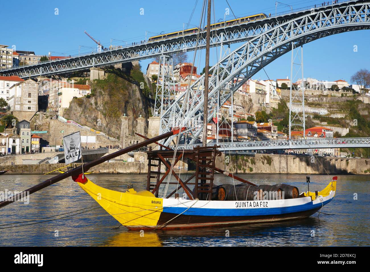 Rabelo boat and bridge in Porto. An old portuguese boat on Douro river ...
