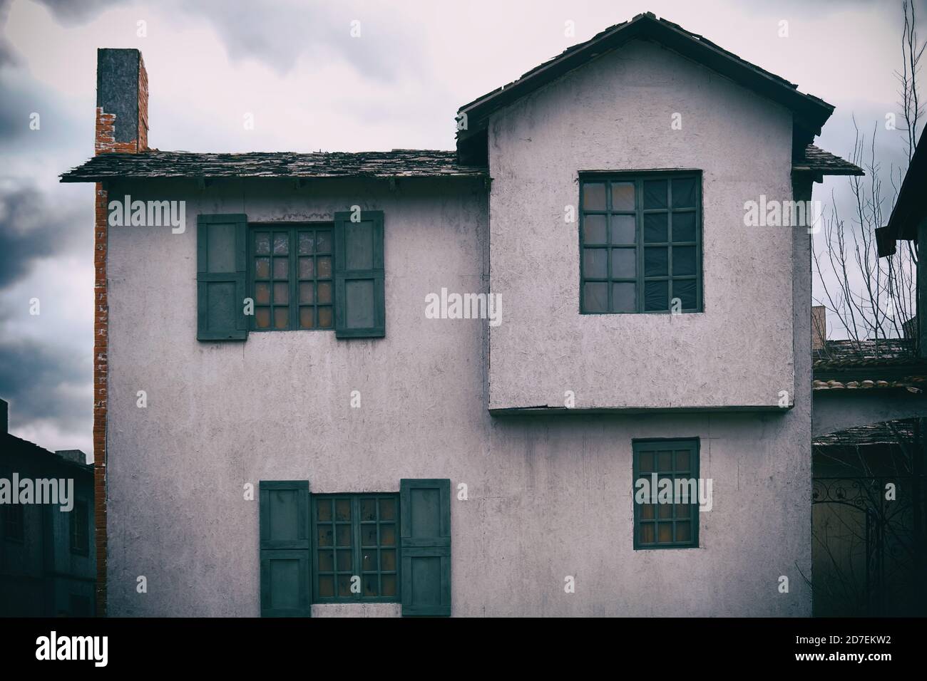 An old two story house with a chimney in the style of retro american ...