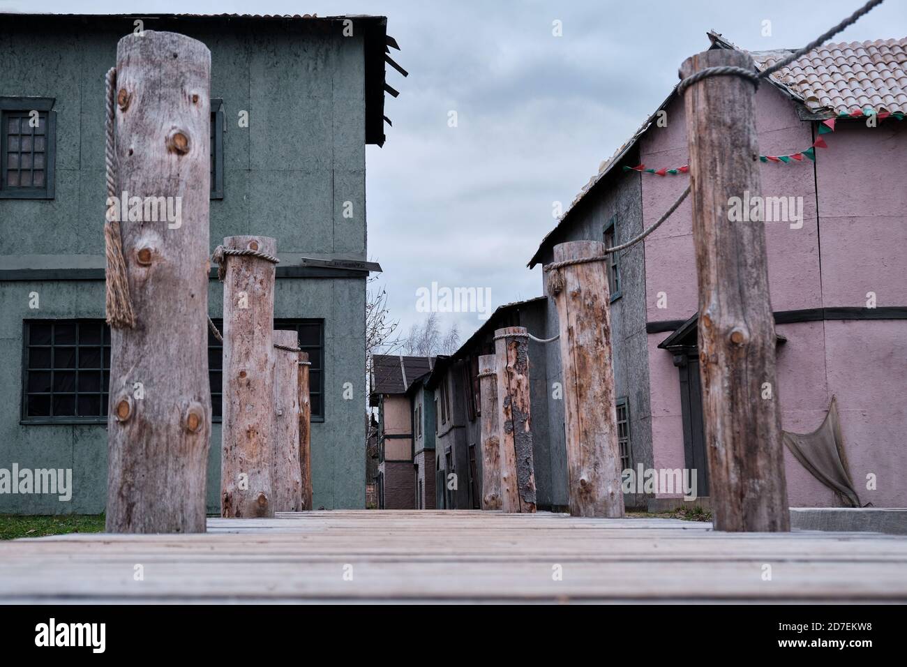 View from the wooden platform on the old river to the street with ...