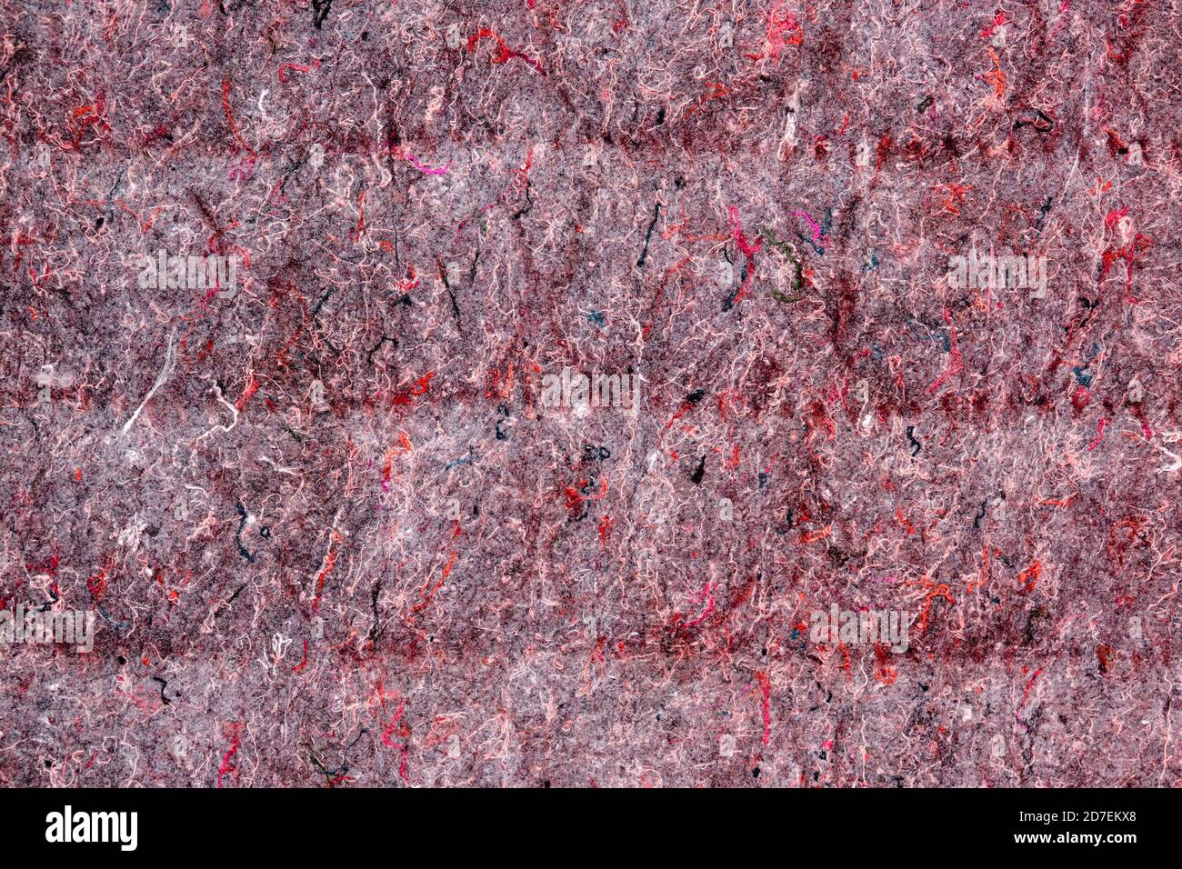 Background of red lining with fibers from non-uniform fabric. Texture ...