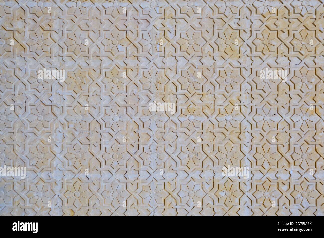 Texture arabic pattern on the stone wall. Orange floral background ...