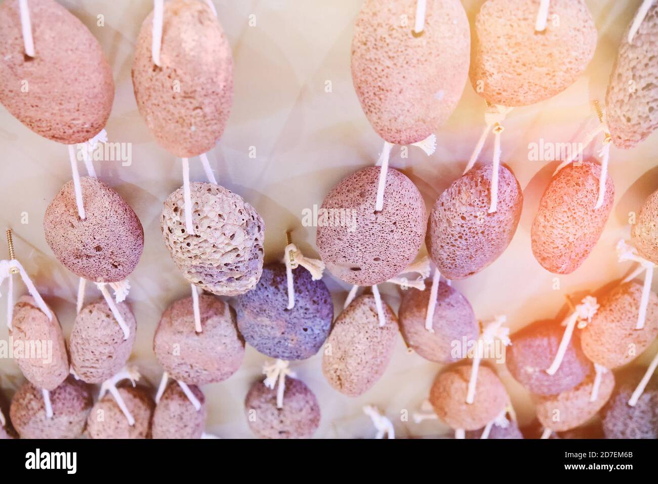 Pumice round shape on the ropes hanging in the Bazaar in the Medina ...