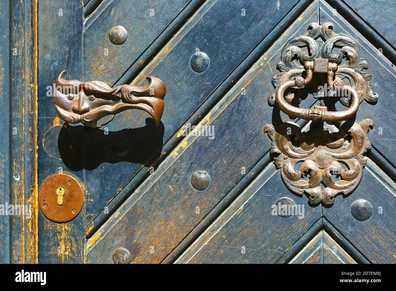 Face-shaped handle in Prague Stock Photo - Alamy