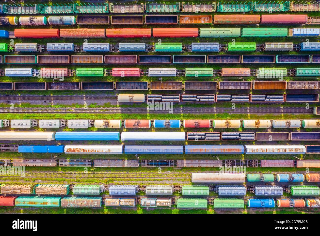 Freight trains made up of multi-colored wagons, aerial view Stock Photo ...