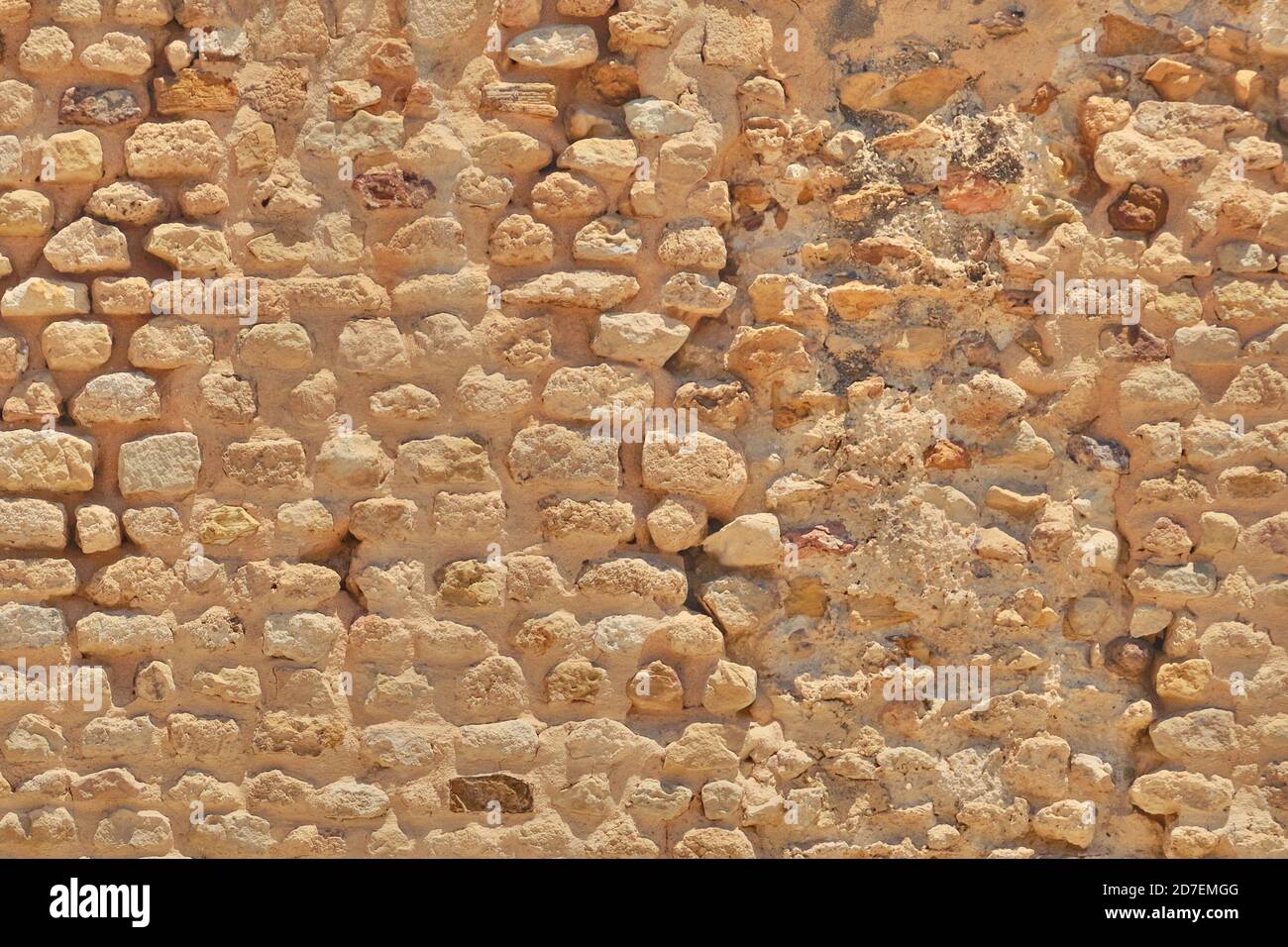 Texture of sandstone bricks, old. The wall on the excavation of stones ...