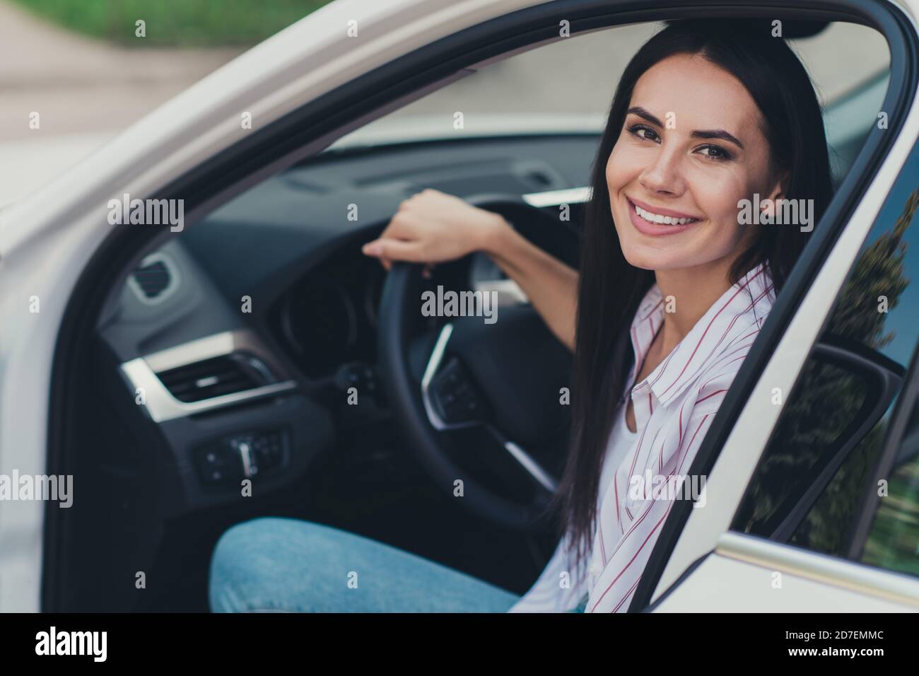 Portrait of positive cheerful girl driving license teacher study ride ...
