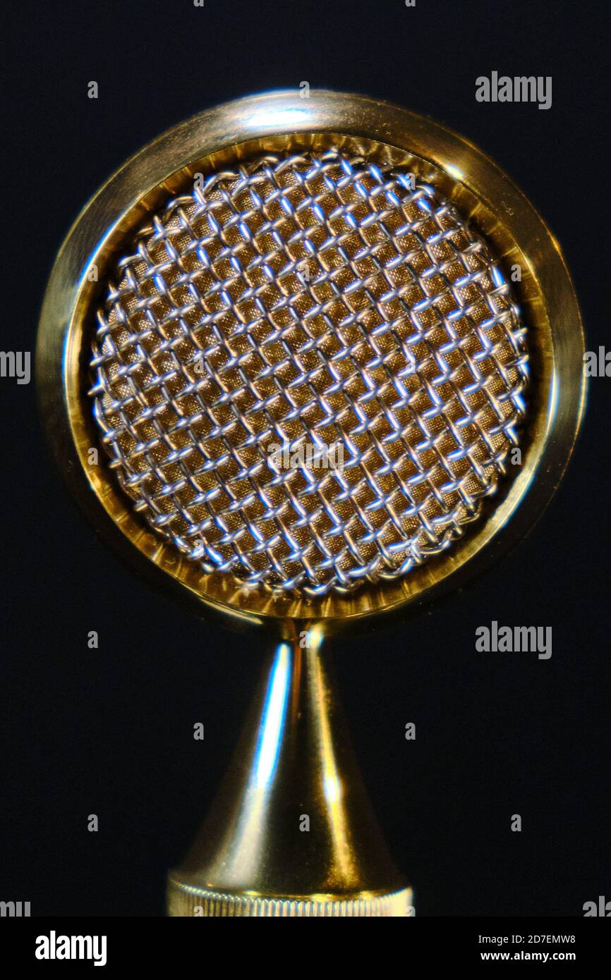 Wide membrane professional microphone golden color. Texture of the ...