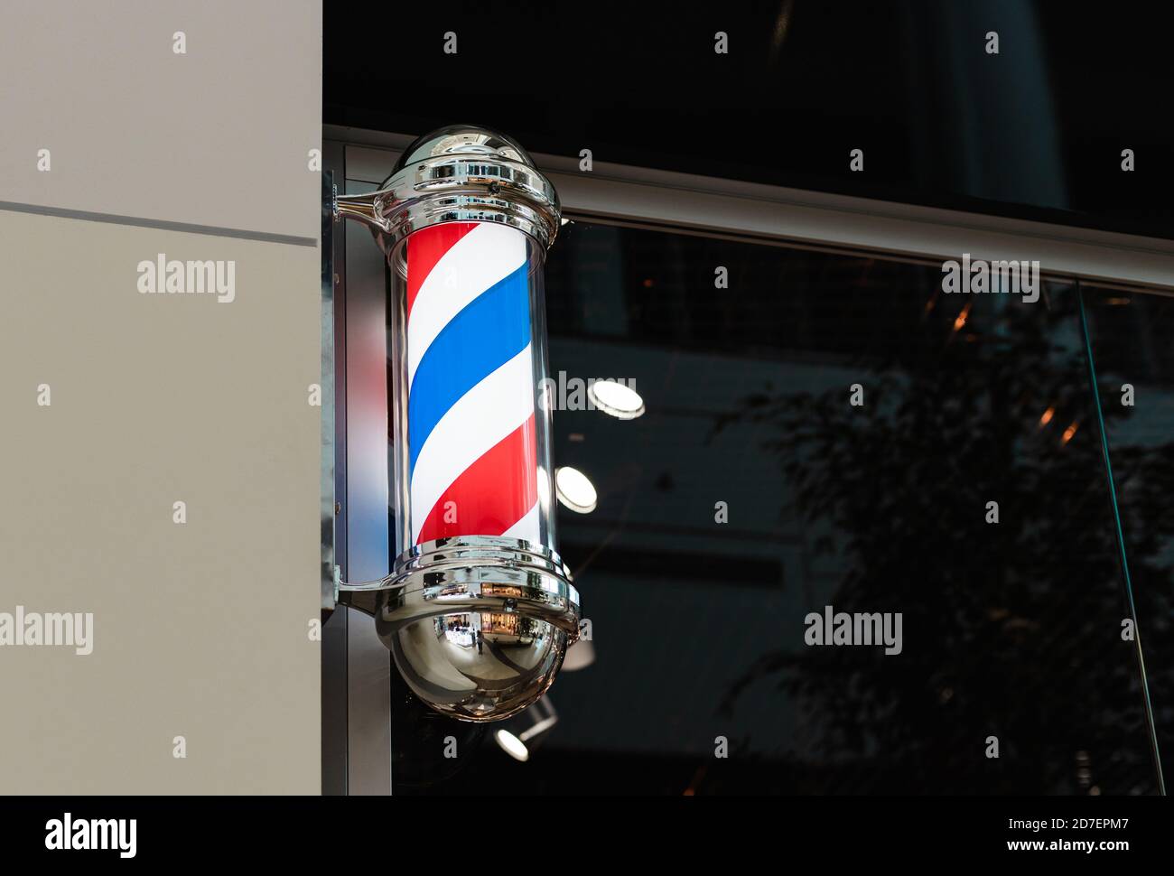 Men's hairdresser, barbershop sign -Barber's Pole Stock Photo - Alamy