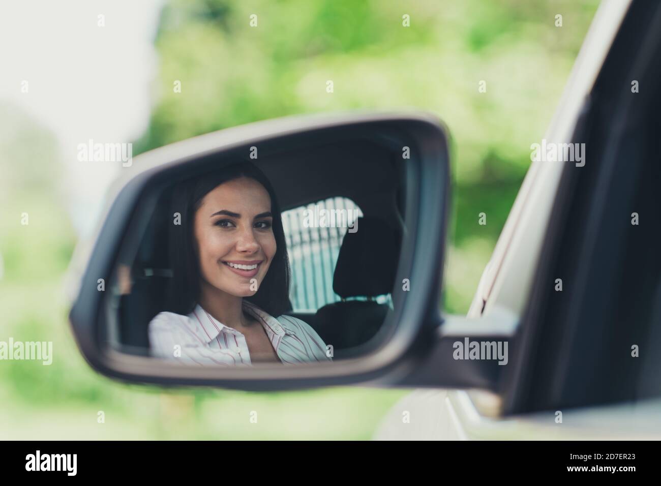Driver face in the taxi mirror hi-res stock photography and images - Alamy
