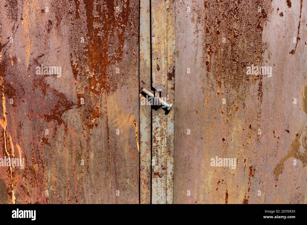 Grunge background. Metal old rusty door closed with a bolt Stock Photo ...