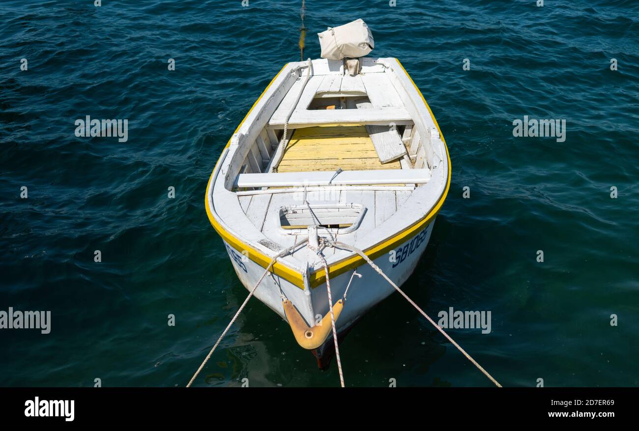 Coastal landscape with moored boat on sunny day. High angle Stock Photo ...