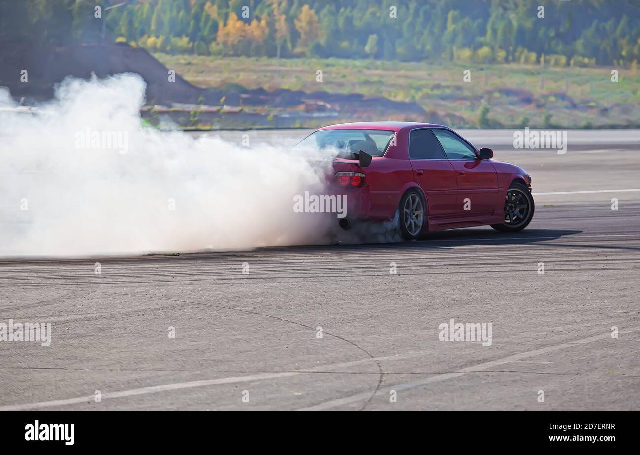 Race car drifting on speed track Stock Photo - Alamy