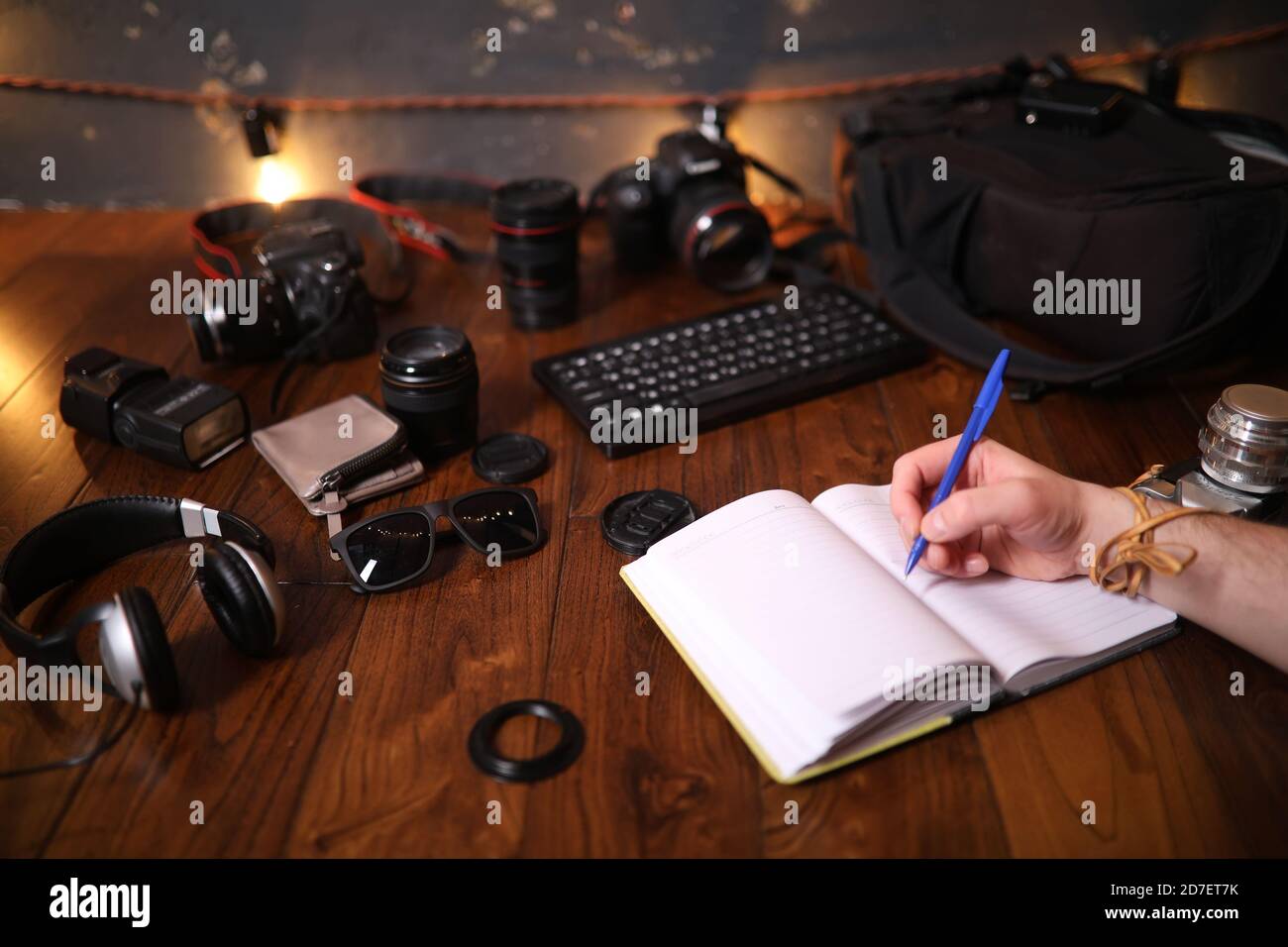 The photographer's desk, digital camera accessories and lenses Stock ...