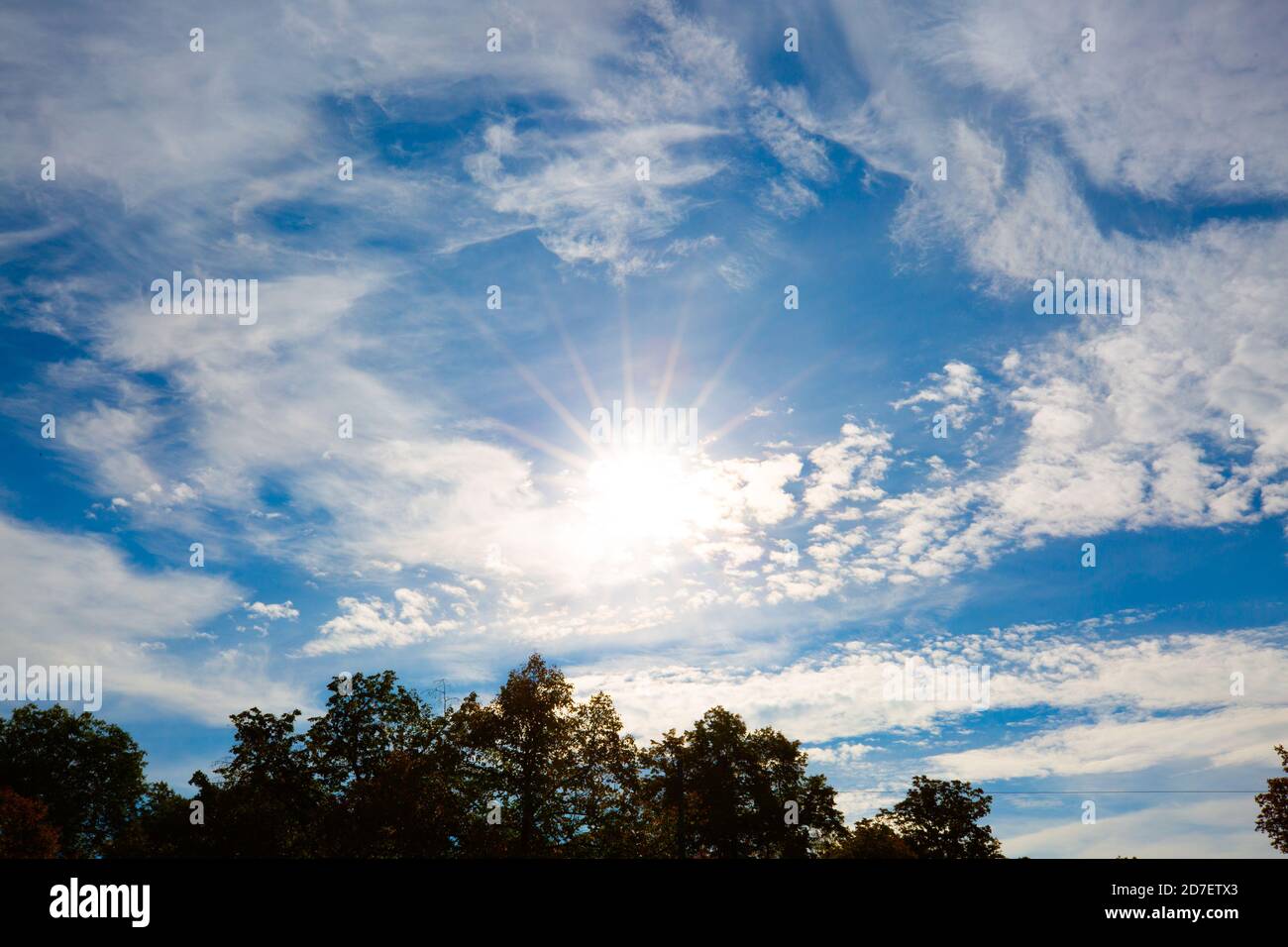 bright sun with blue sky, autumn Stock Photo - Alamy