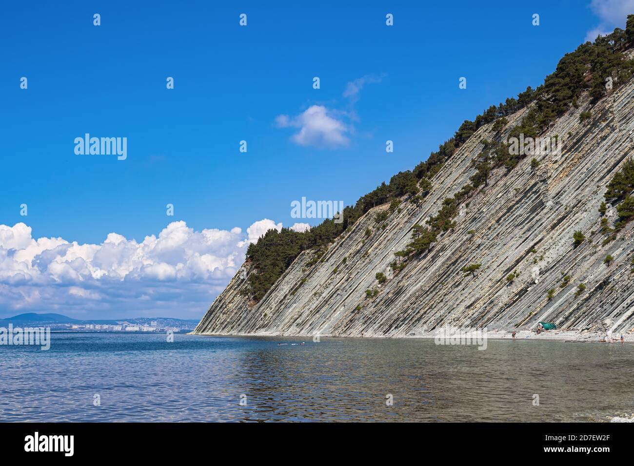 Beautiful summer landscape, bright blue sky with clouds, steep cliffs ...