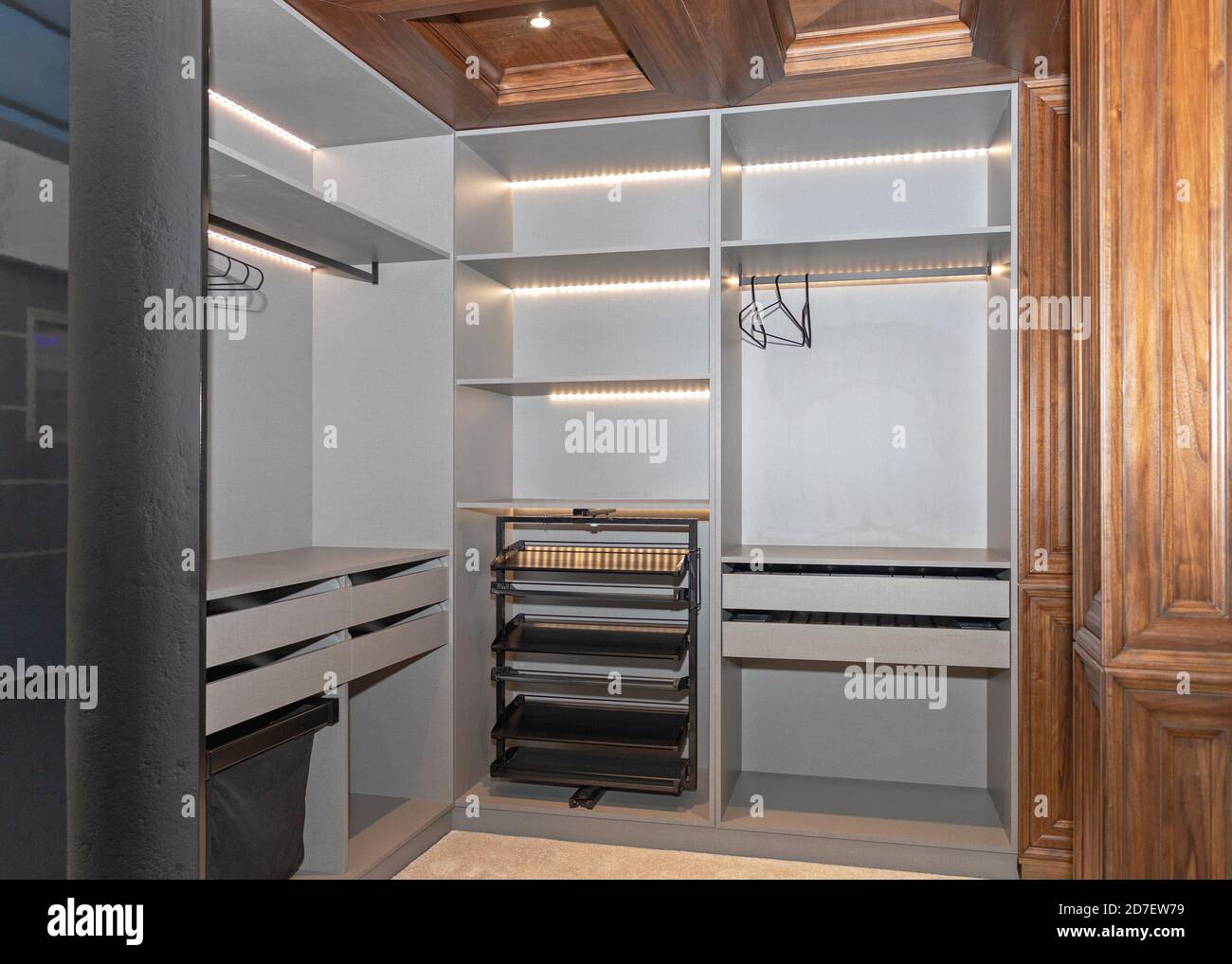 Empty Walk in Wardrobe Closet With Lights Stock Photo - Alamy