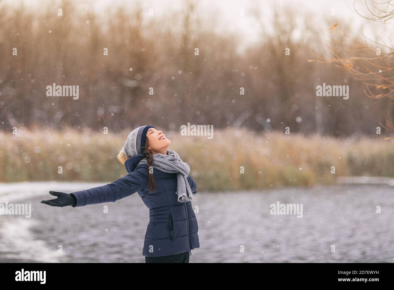 Girl enjoying snowfall hi-res stock photography and images - Alamy