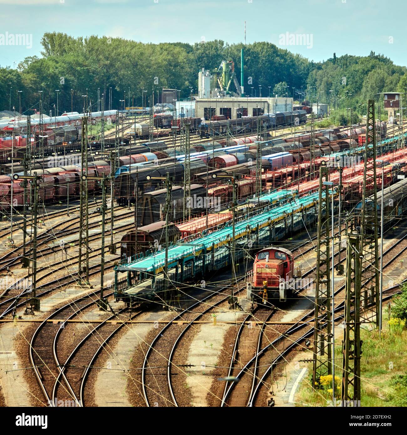marshalling yard with tracks, switches, freight trains and the signal ...