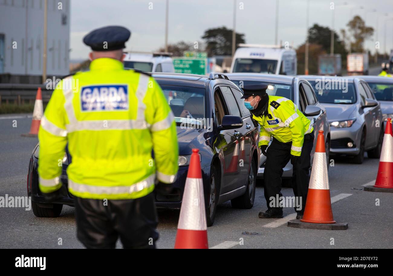 Gardai at a checkpoint on the M7 motorway at the border of Dublin and ...