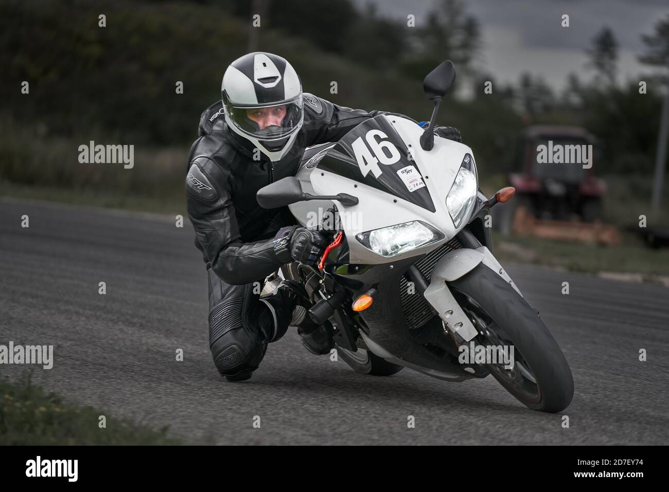 12-09-2020 Riga, Latvia man riding motorcycle in asphalt road ...