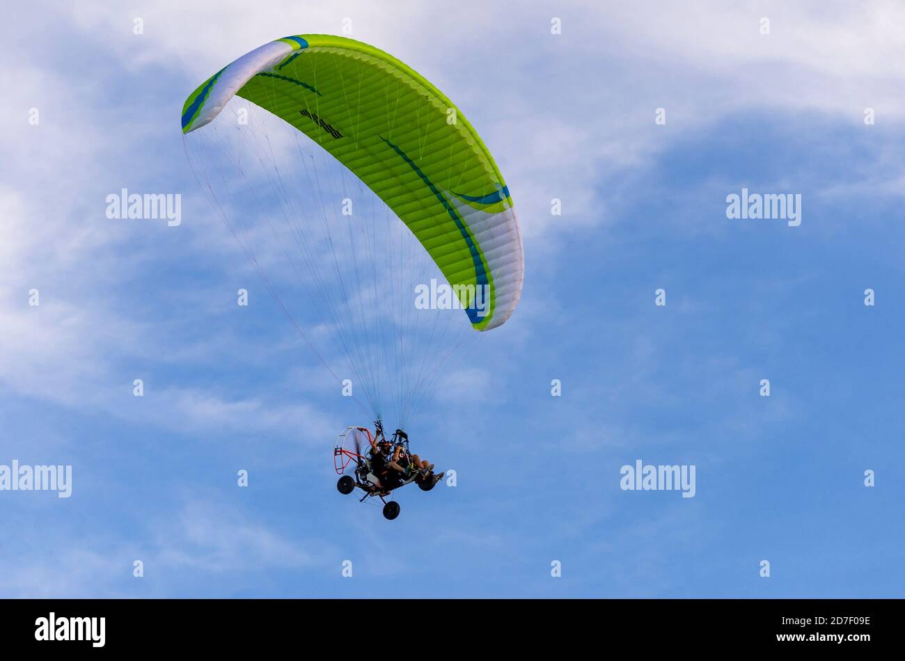 Paraglider flying free in the sky Stock Photo - Alamy