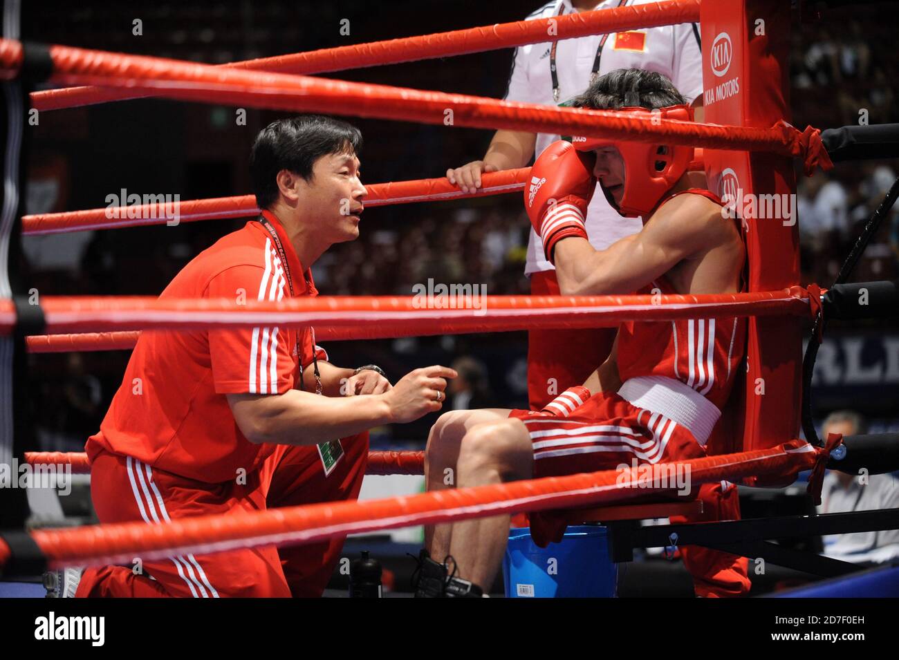 Boxer and coach at the corner ring, duirng an amateur boxing match ...