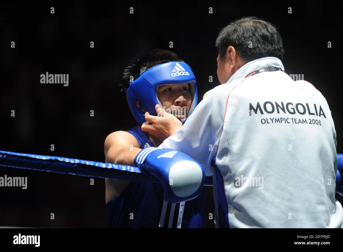 Mongolia's boxer and coach at the ring's corner, during an amateur ...