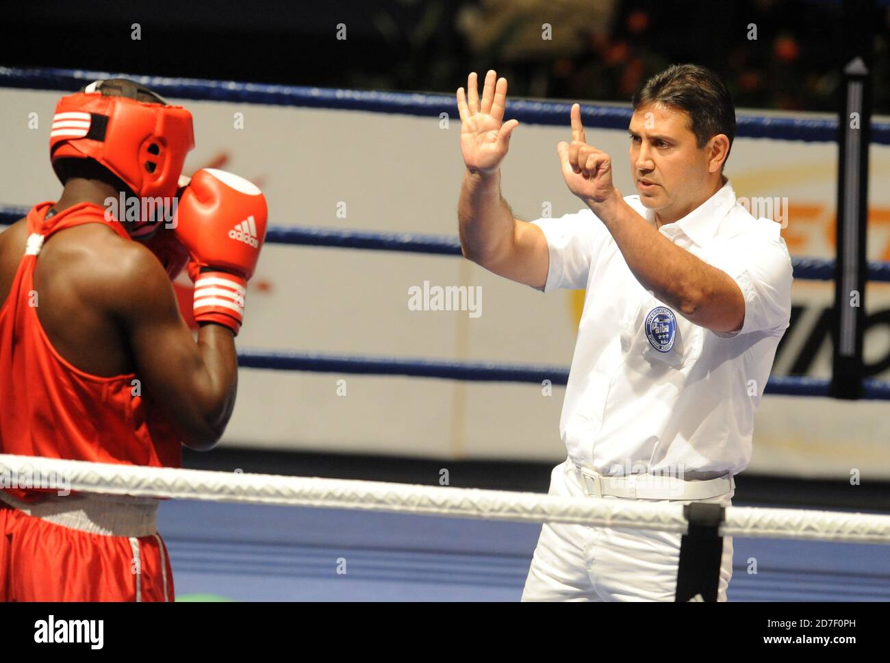 Referee and boxers during an amateur boxe match during the AIBA World ...