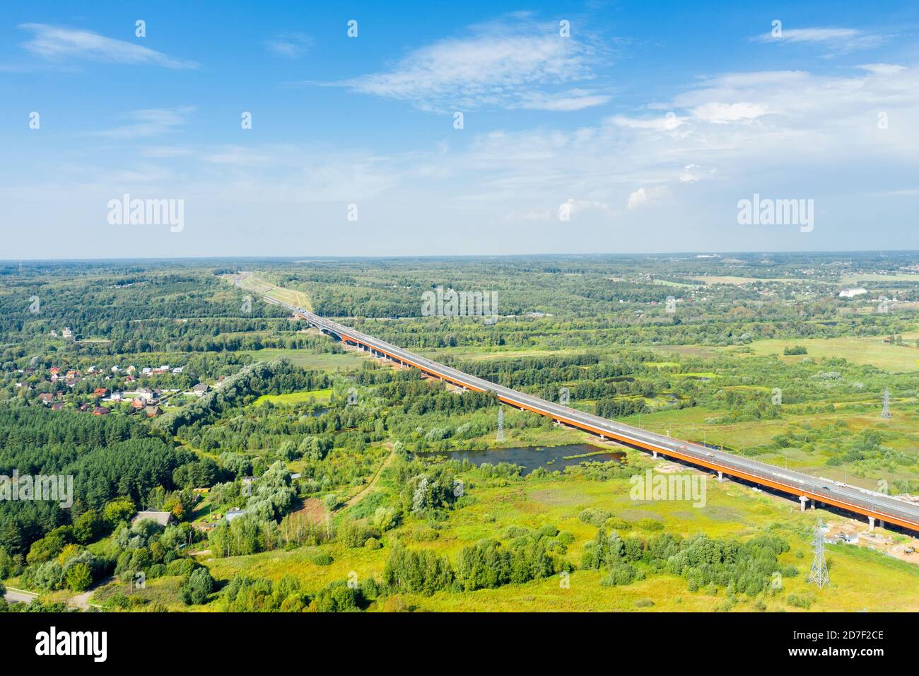 Aerial view of construction of road bridge on motorway in countryside ...