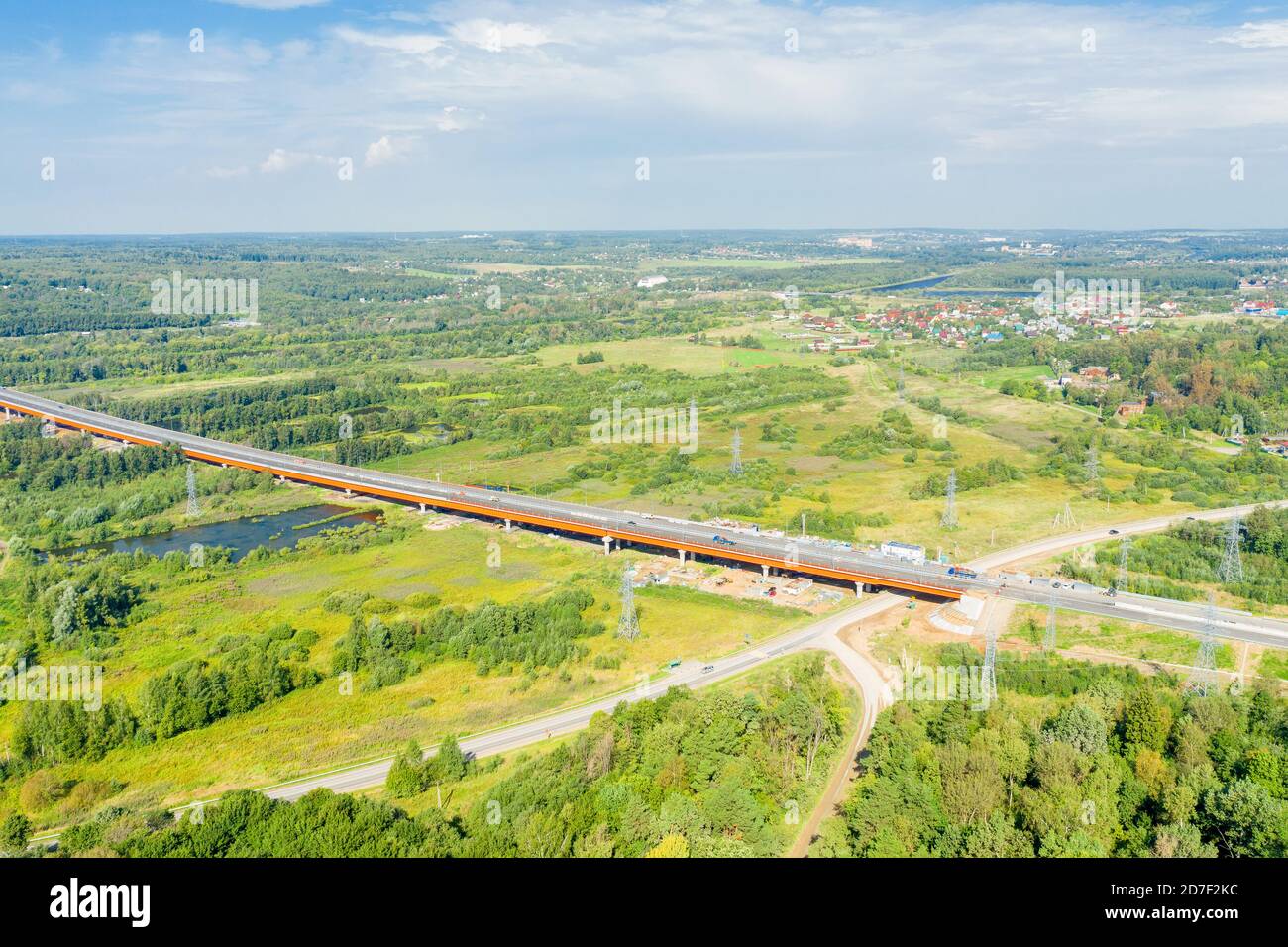 Aerial view of construction of road bridge on motorway in countryside ...