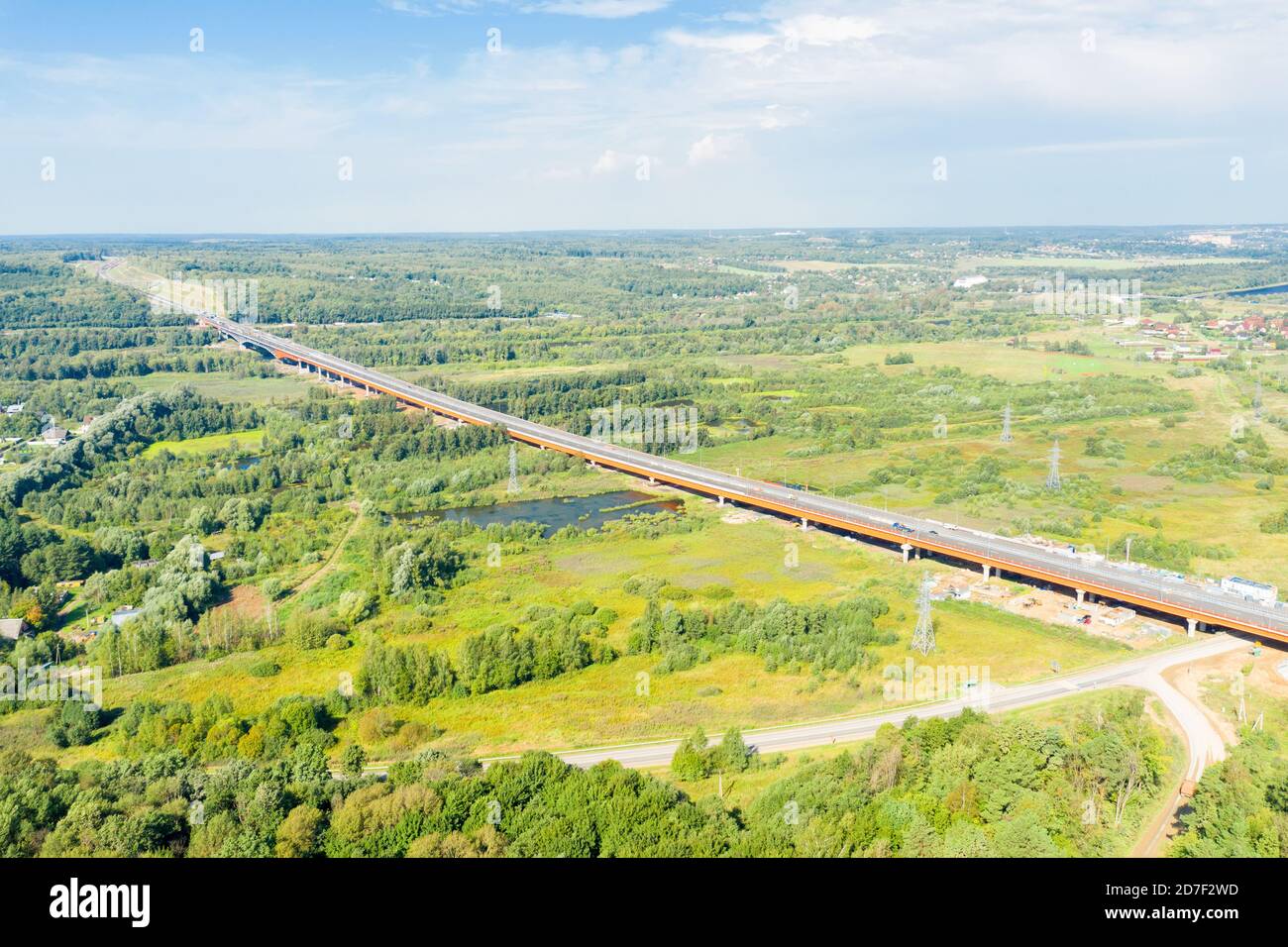 Aerial view of construction of road bridge on motorway in countryside ...