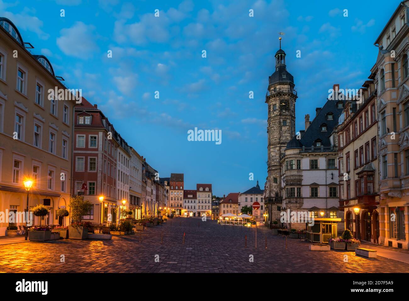View to the facades and roofs of the townhall building and old houses ...
