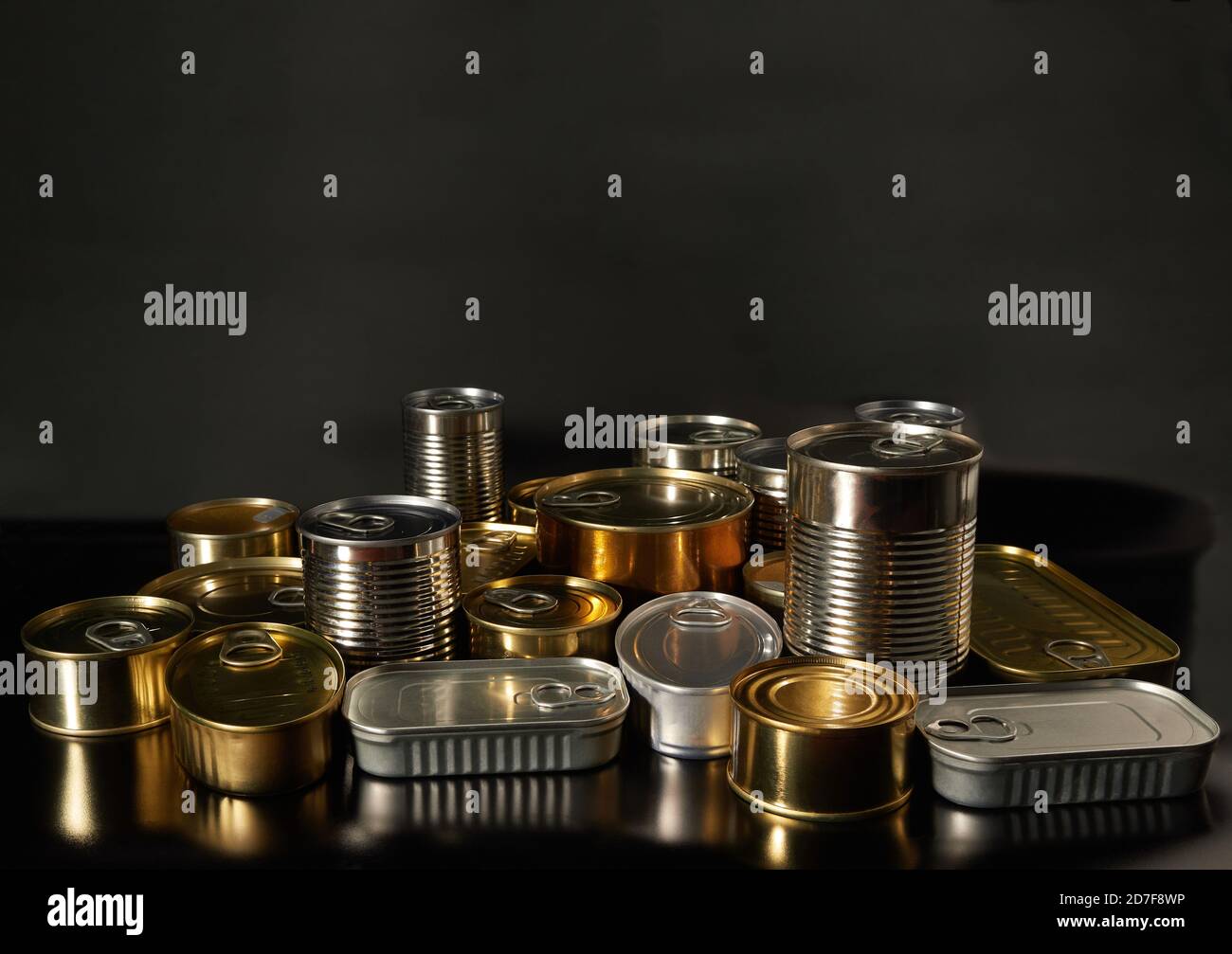 Different types of cans with prepared foods for consumption, vegetables ...