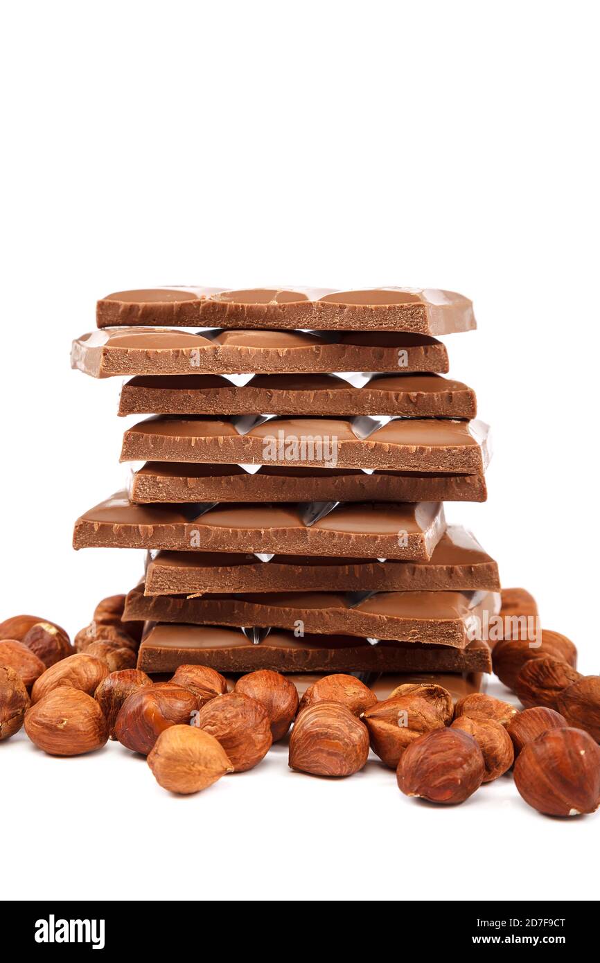 Chocolate tiles and nuts isolated on white background Stock Photo - Alamy
