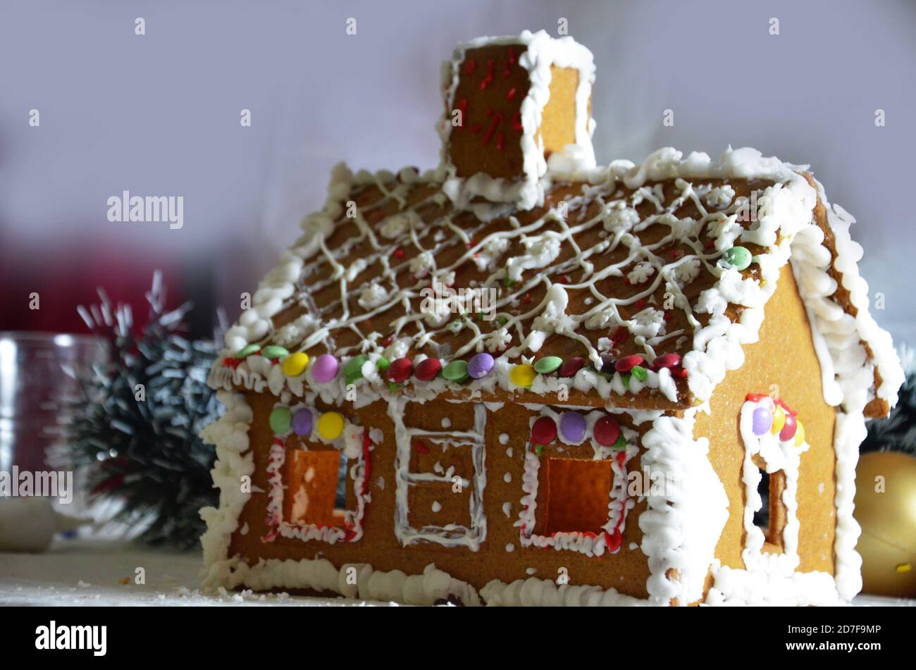Gingerbread house with lights inside, dark background Stock Photo - Alamy