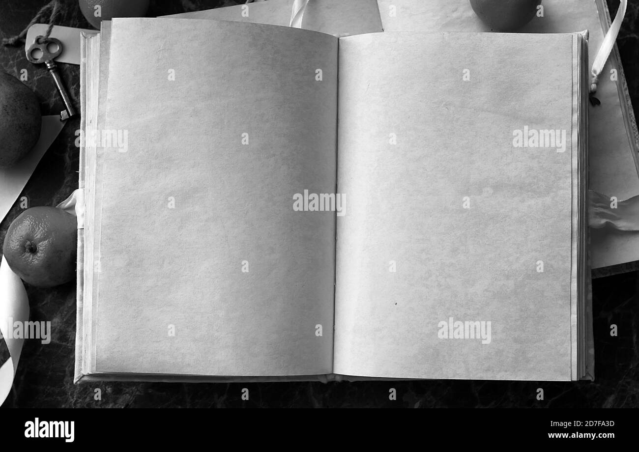 Green table with book Black and White Stock Photos & Images - Alamy