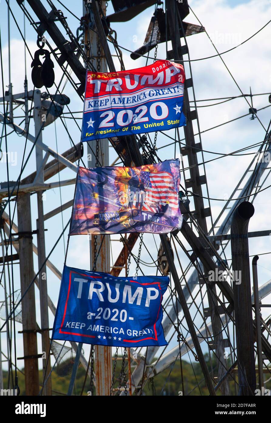 Trump flags flying from a fishing trawler on Cape Cod, Massachusetts ...