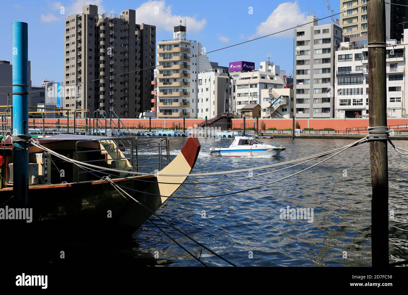 Tour boat docking along Sumida River in Ryogoku district.Sumida Ku ...