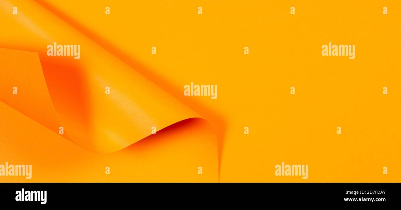 Abstract geometric shape orange color paper background Stock Photo - Alamy