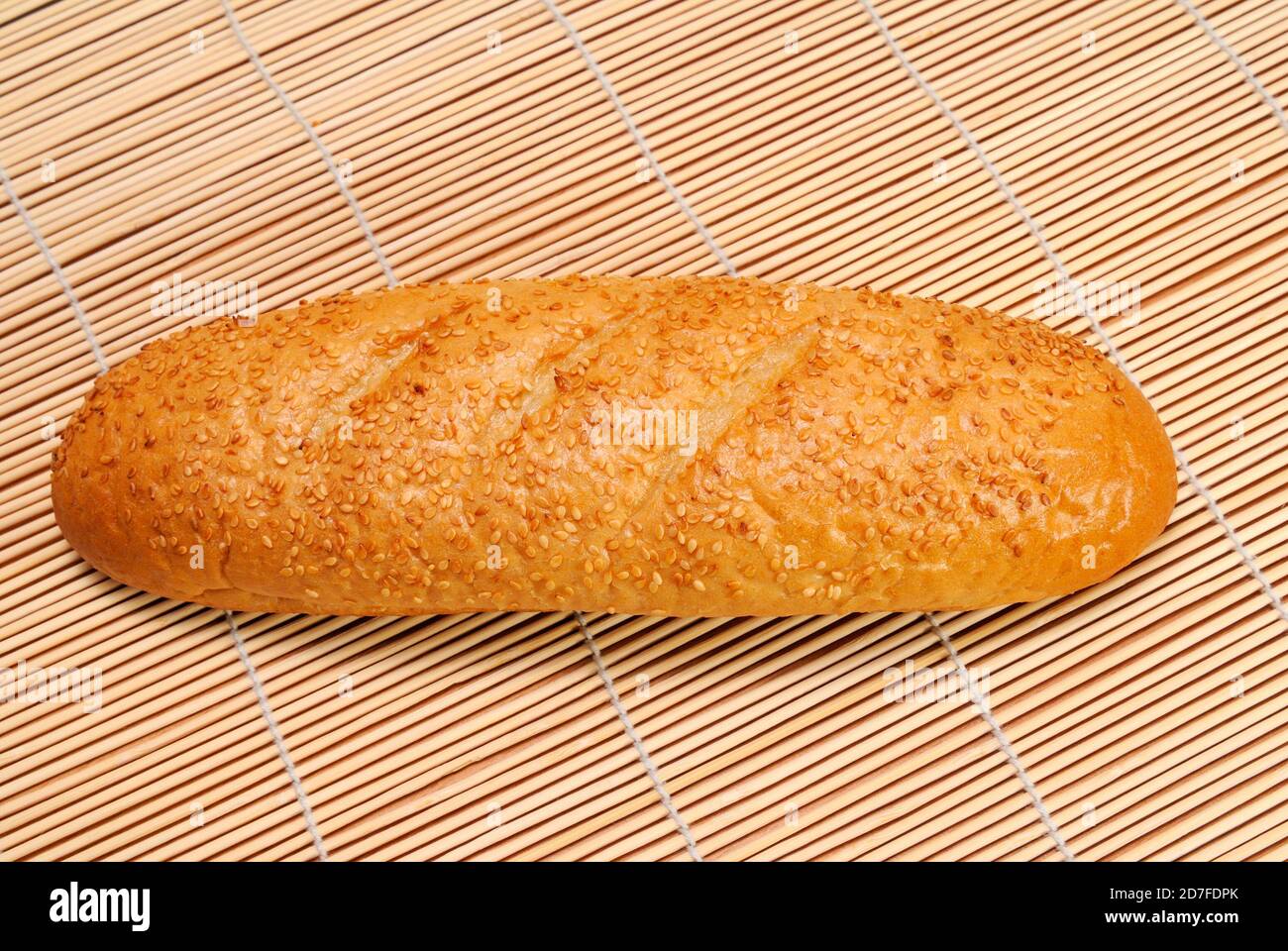 Mini French bread baguette with sesame seeds Stock Photo - Alamy