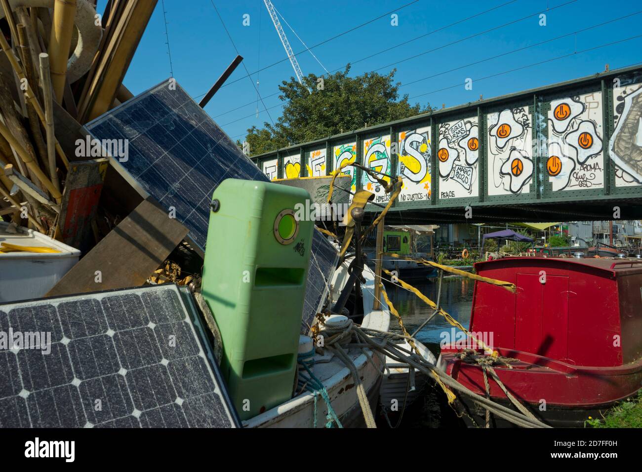 Narrow boats with solar panels on the water canal near Stratford by ...