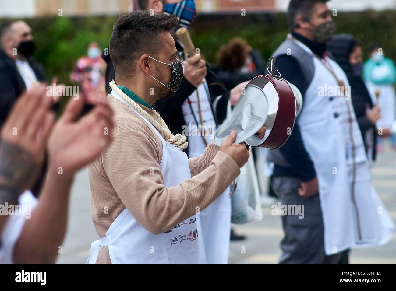 Protesters hitting pans and wearing face masks at Demonstration for the ...