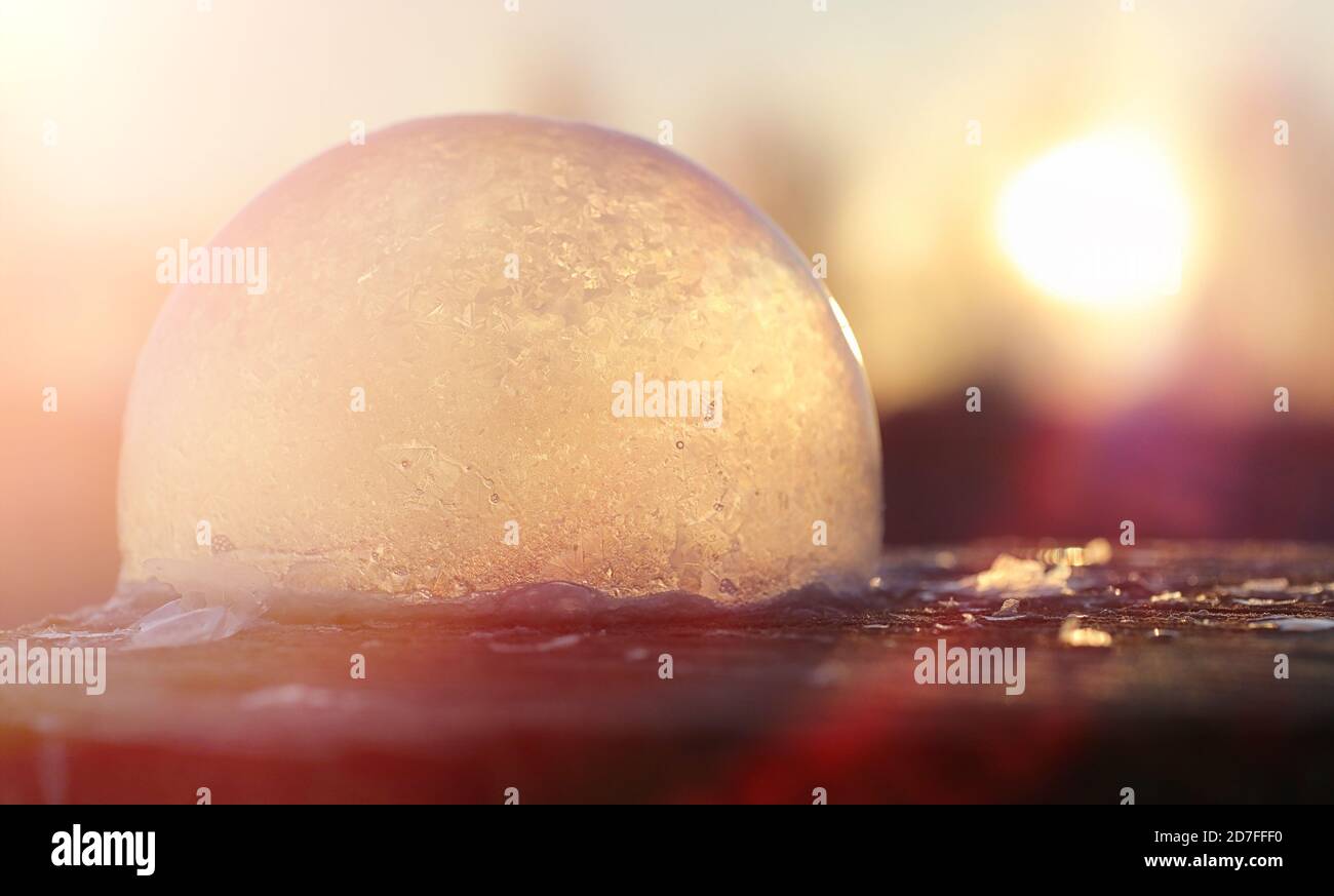 Soap bubbles freeze in the cold. Winter soapy water freezes in air ...