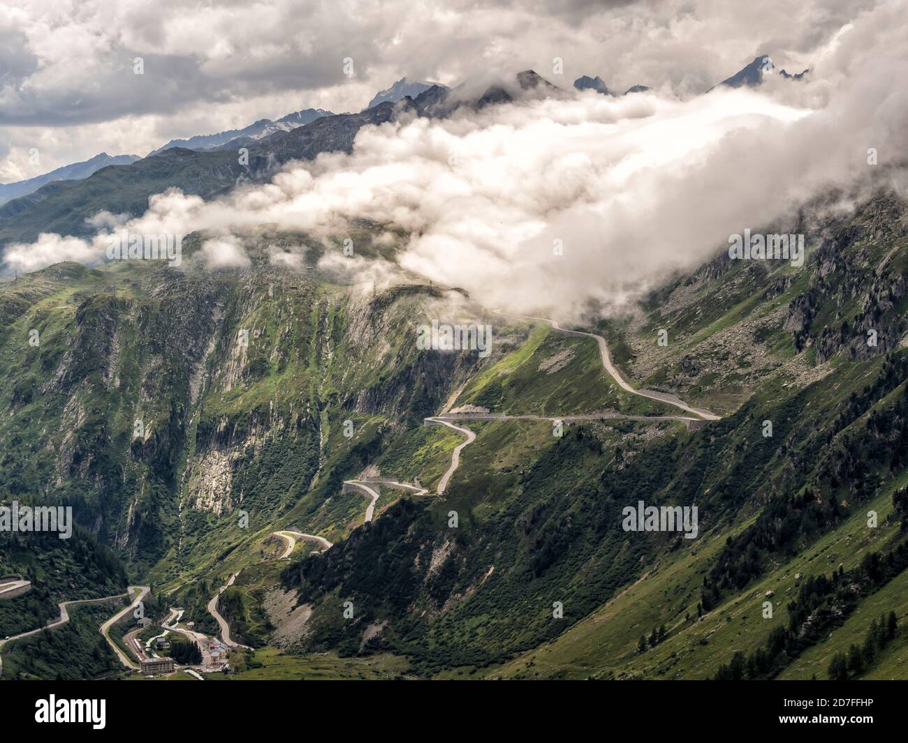 Clouds start to cover Grimsel mountain pass as weather is changing ...