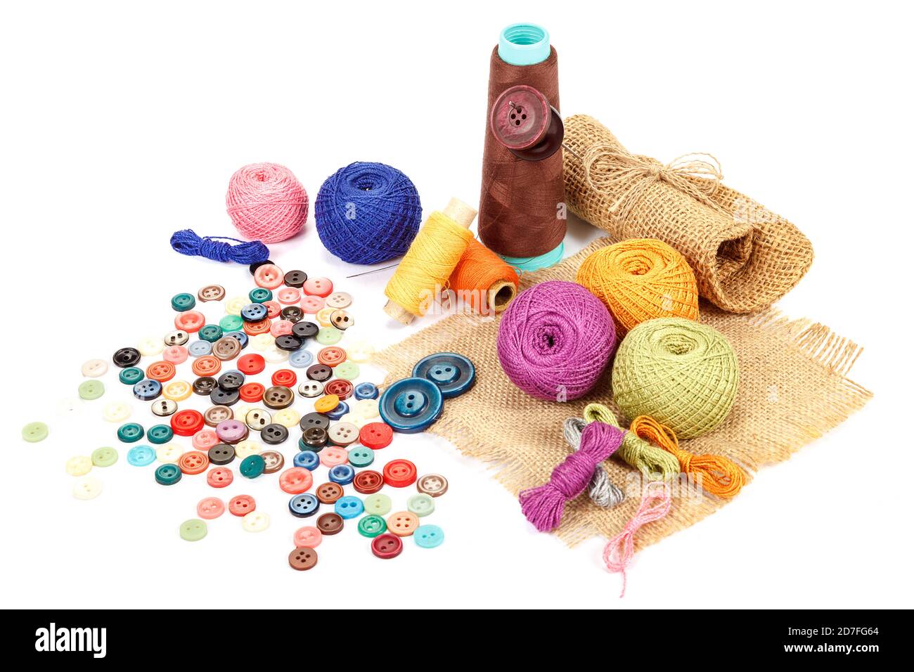 Thread, buttons, scissors isolated on white background. Sewing supplies ...